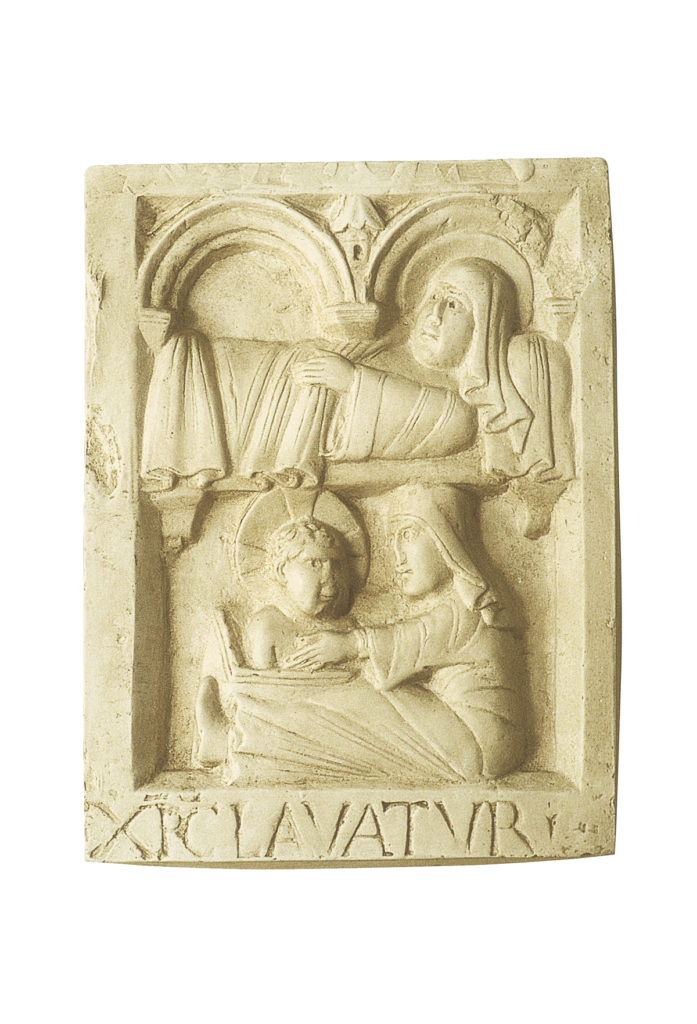 Mary giving birth and Jesus' first bath, a carved panel from the portal ...